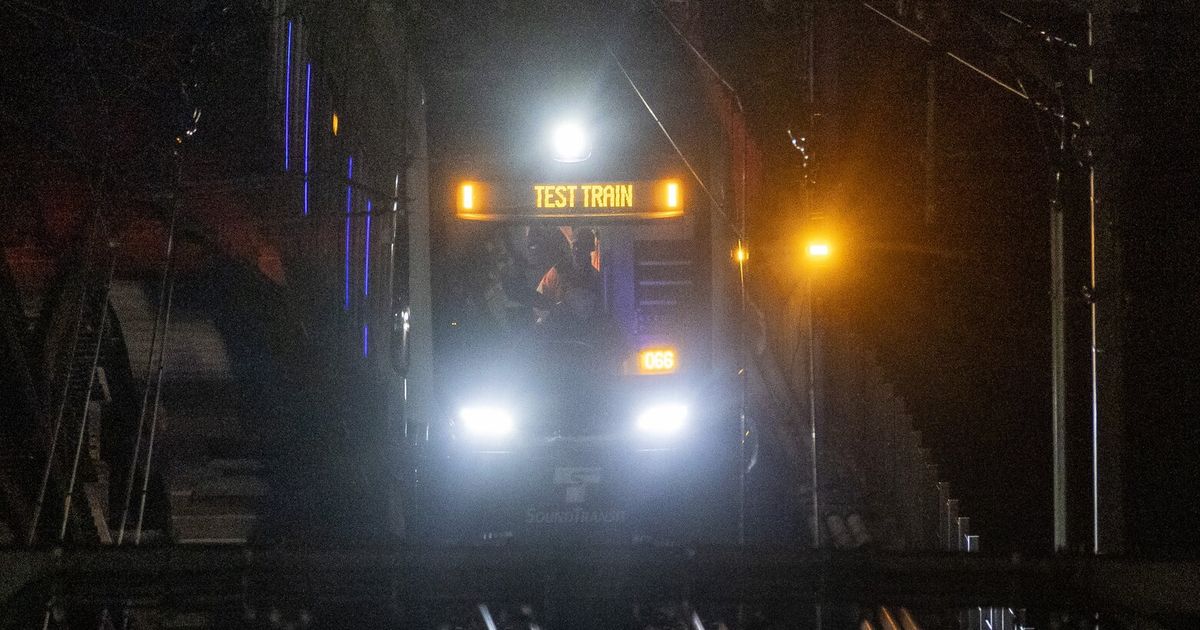 Seattle light rail makes history with test run across I-90 floating ...