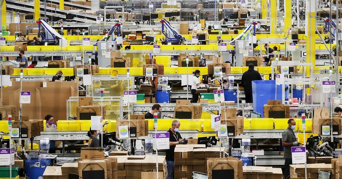 Amazon bumps pay, lowers health insurance costs for warehouse workers ...