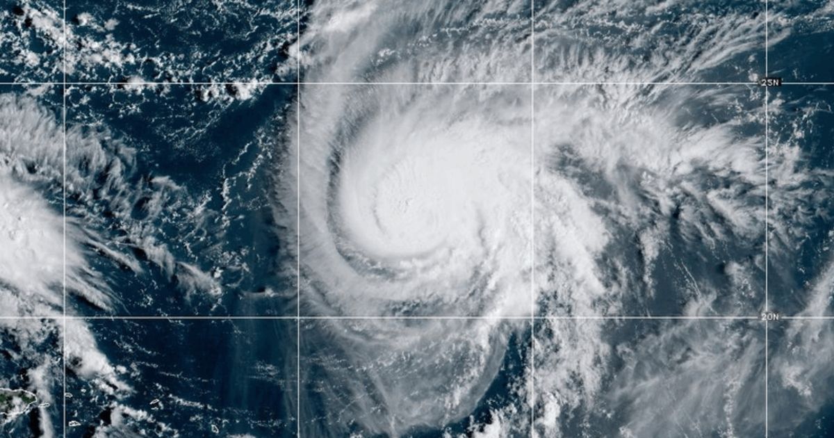 Two tropical storm systems near each other could wind up shielding the ...