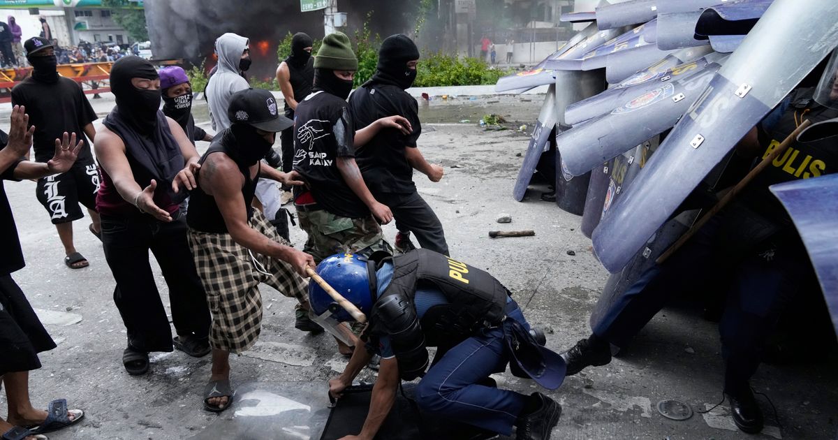 Dozens arrested and hurt in clashes with police near Philippine ...