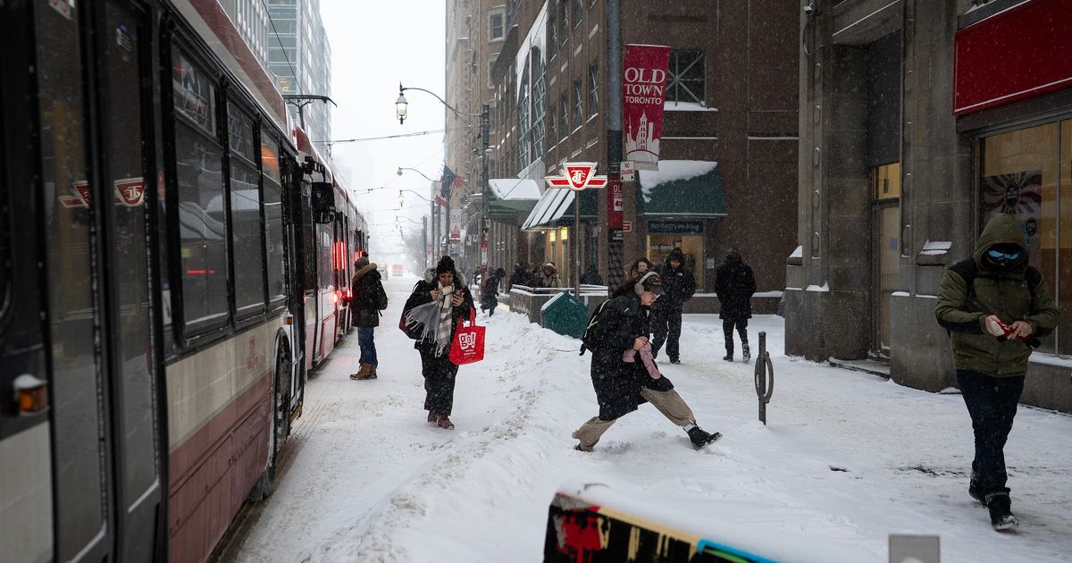 Toronto schools closed and commuters face delays as heavy snow blankets ...