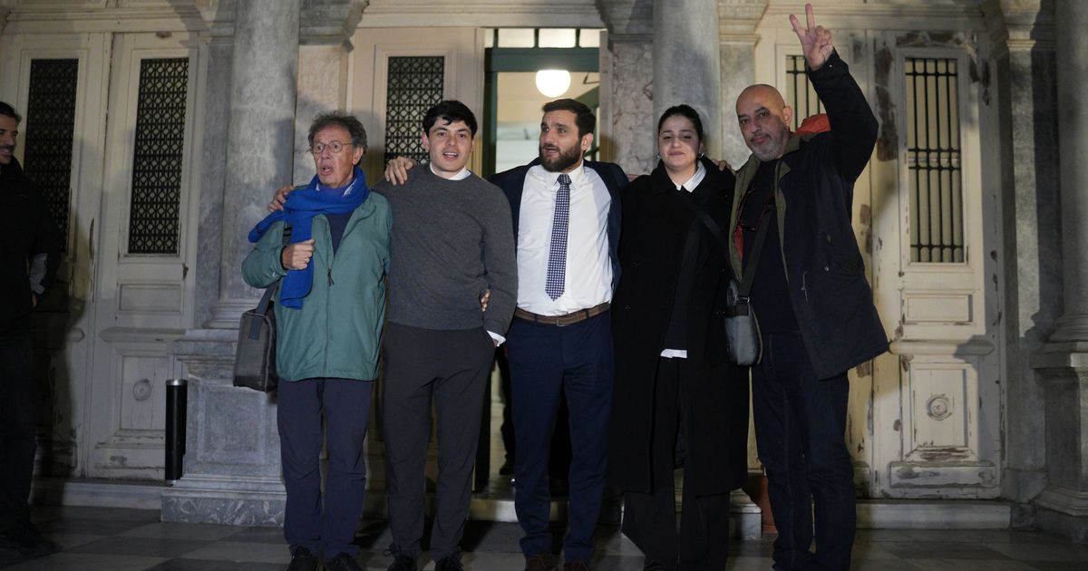 Syrian swimmer among activists cleared by Greek court of aiding migrant ...