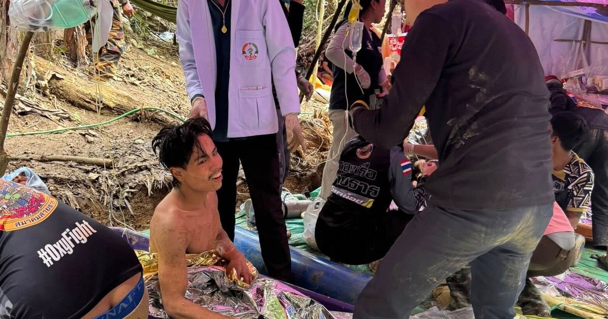 Rescuers free 4 men who had been trapped in a flooded Laos cave, search ...