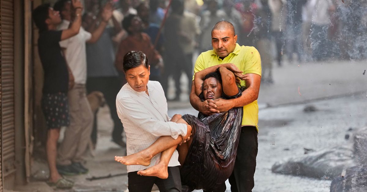 Photos show rescue efforts and aftermath of New Delhi building fire ...