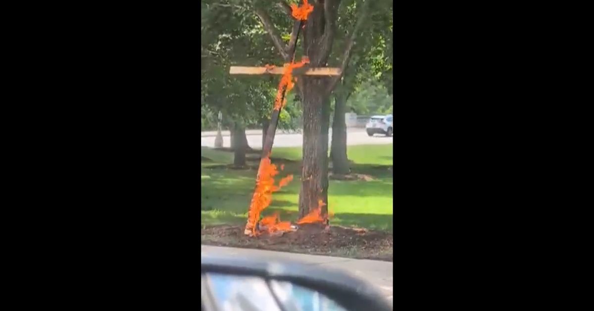Police are investigating a large burning cross at a Chicago park | The ...